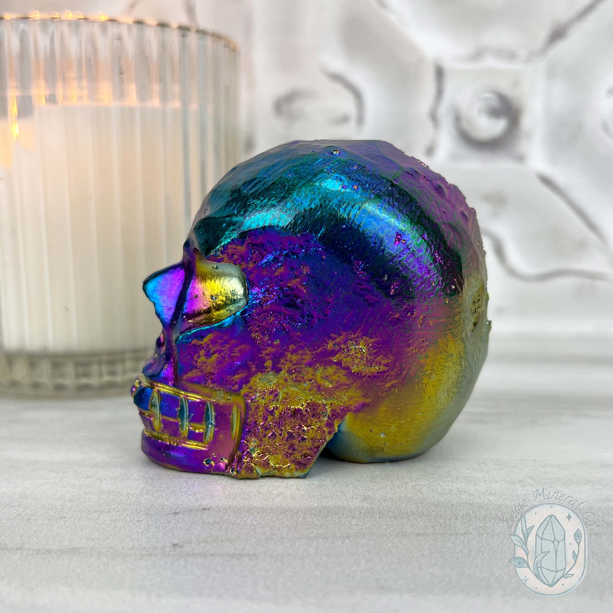 Titanium Aura Quartz Crystal Skull Carving | Eerie Mineral Co.