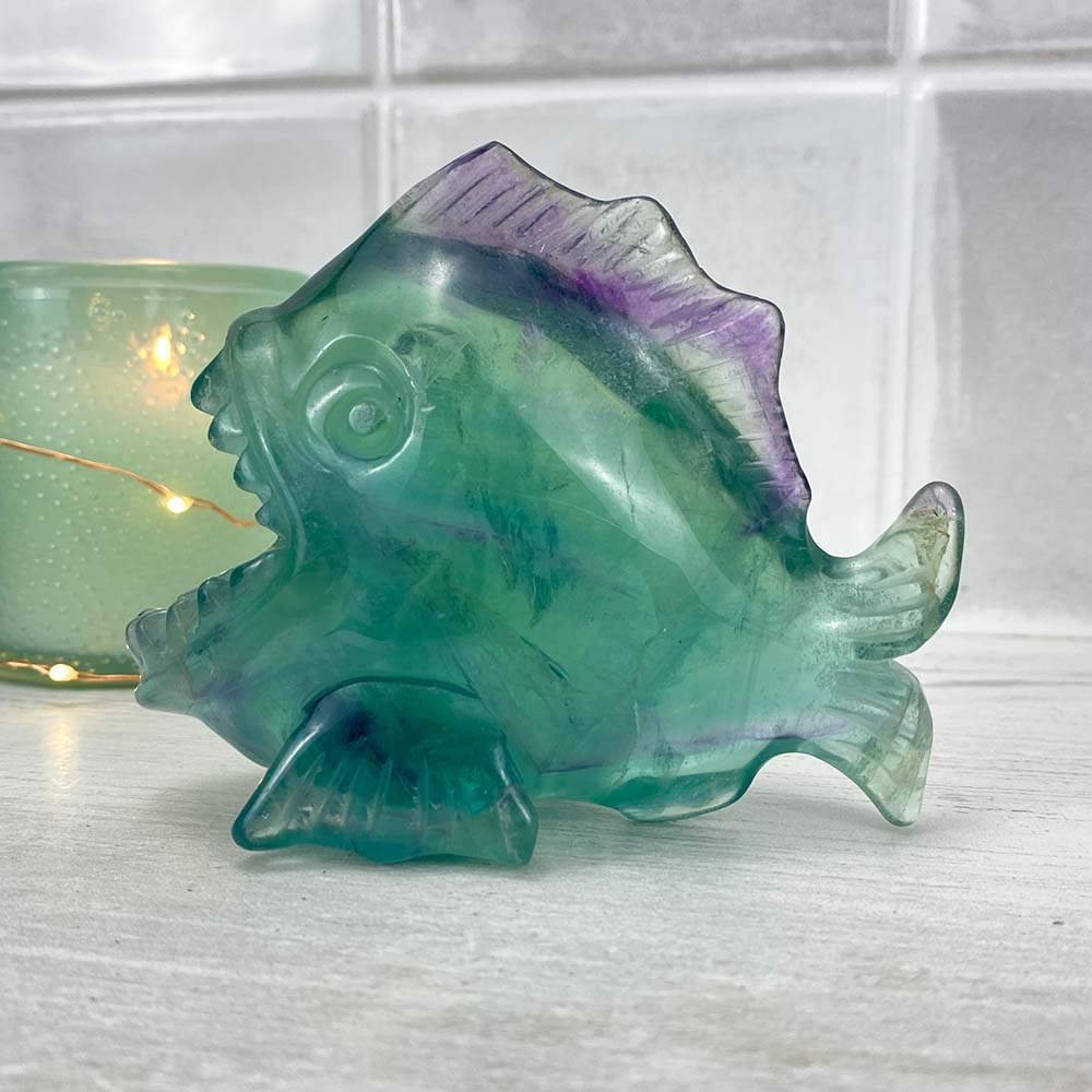 Polished Rainbow Fluorite Crystal Piranha Carving | Eerie Mineral Co.